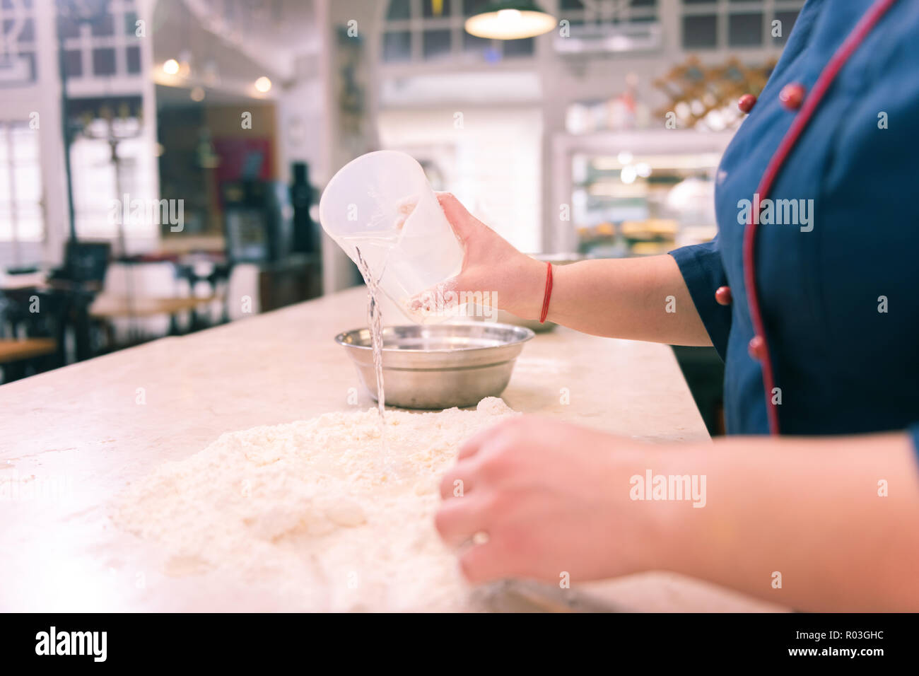 Adding the water hi-res stock photography and images - Alamy