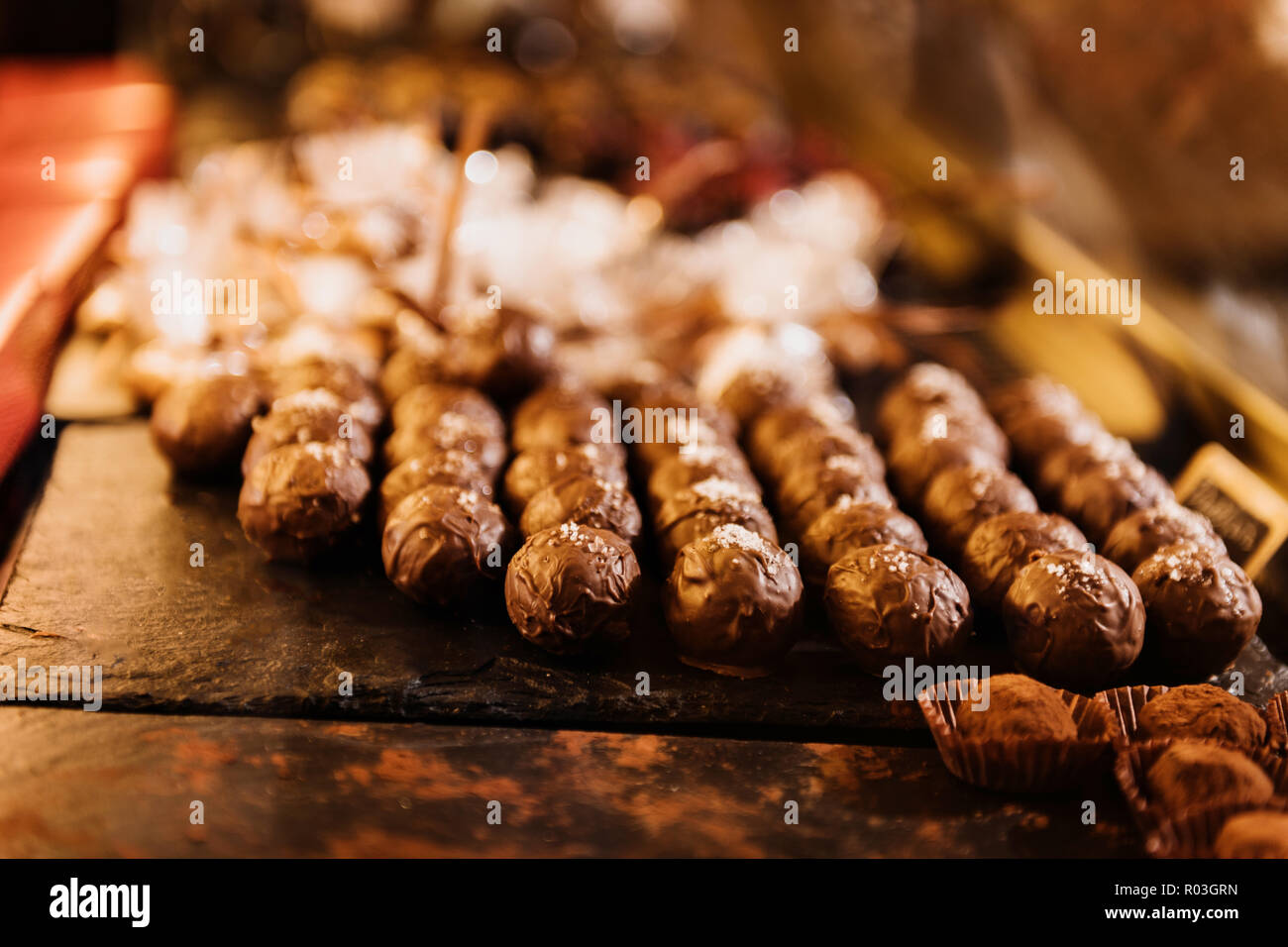 Good-looking delicious chocolate sweets lying in nice bakery Stock ...