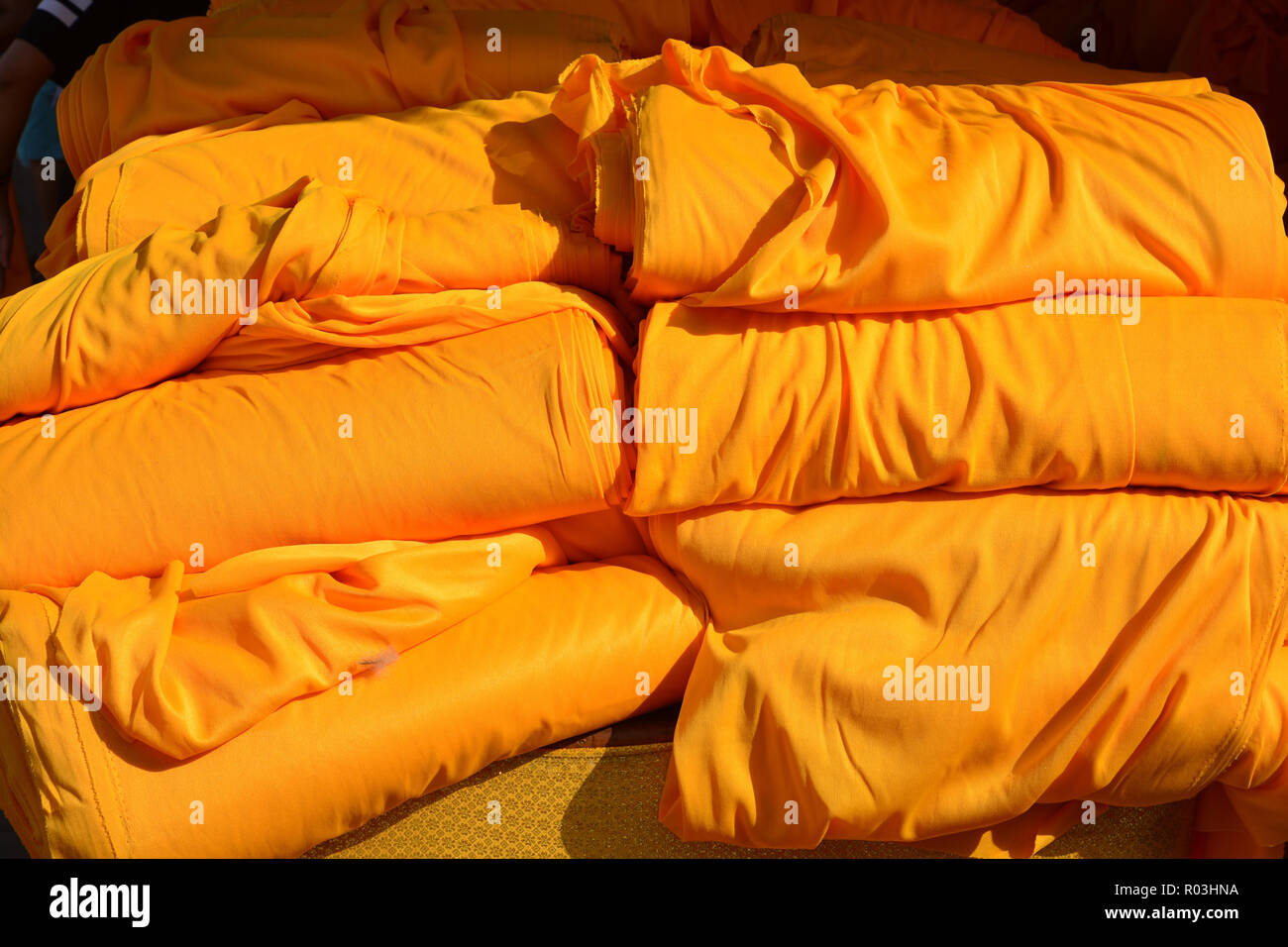 yellow robe of Buddhist monk pattern background Stock Photo - Alamy