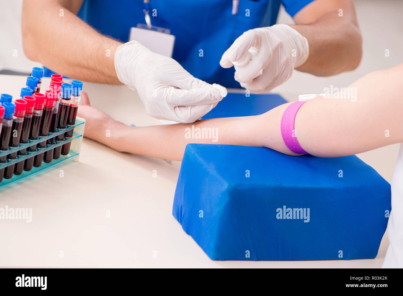 Young patient during blood test sampling procedure Stock Photo - Alamy