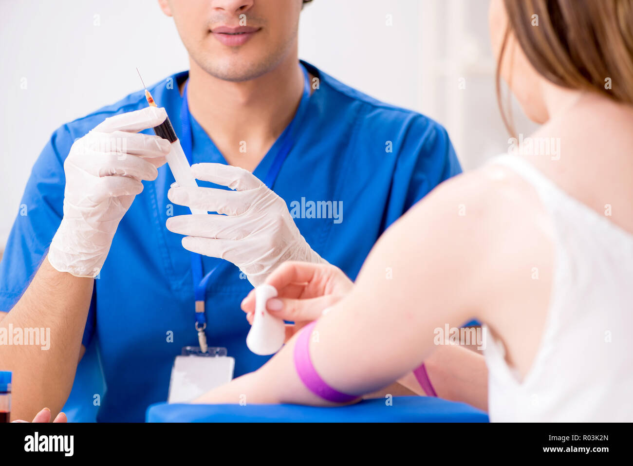 Young patient during blood test sampling procedure Stock Photo - Alamy