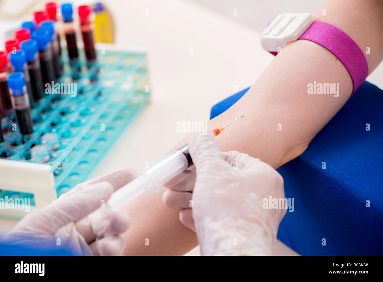 Young patient during blood test sampling procedure Stock Photo - Alamy