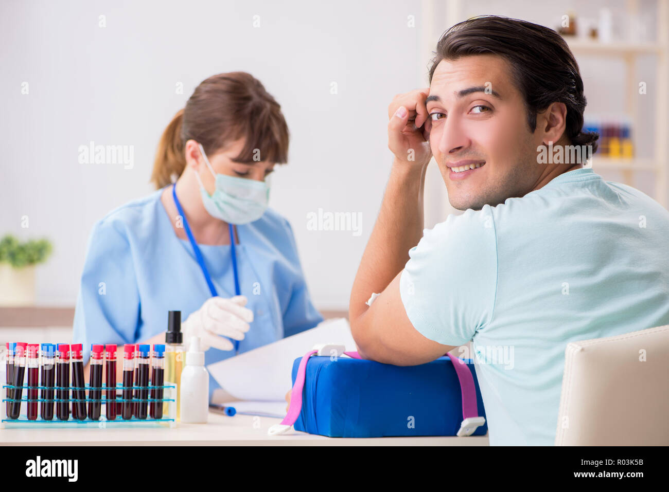 Young patient during blood test sampling procedure Stock Photo - Alamy