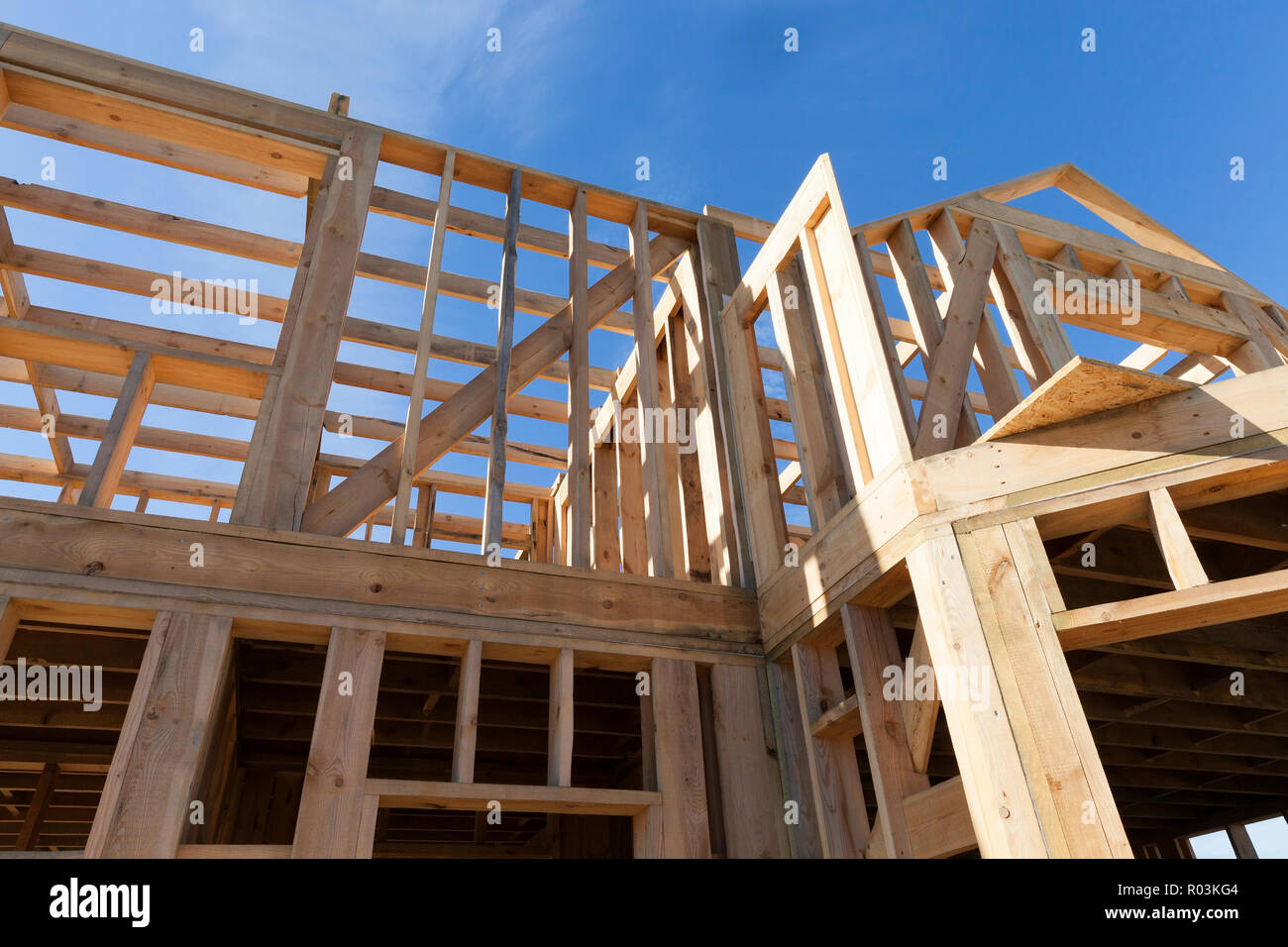 construction of a new frame house, where the frame itself is made of ...