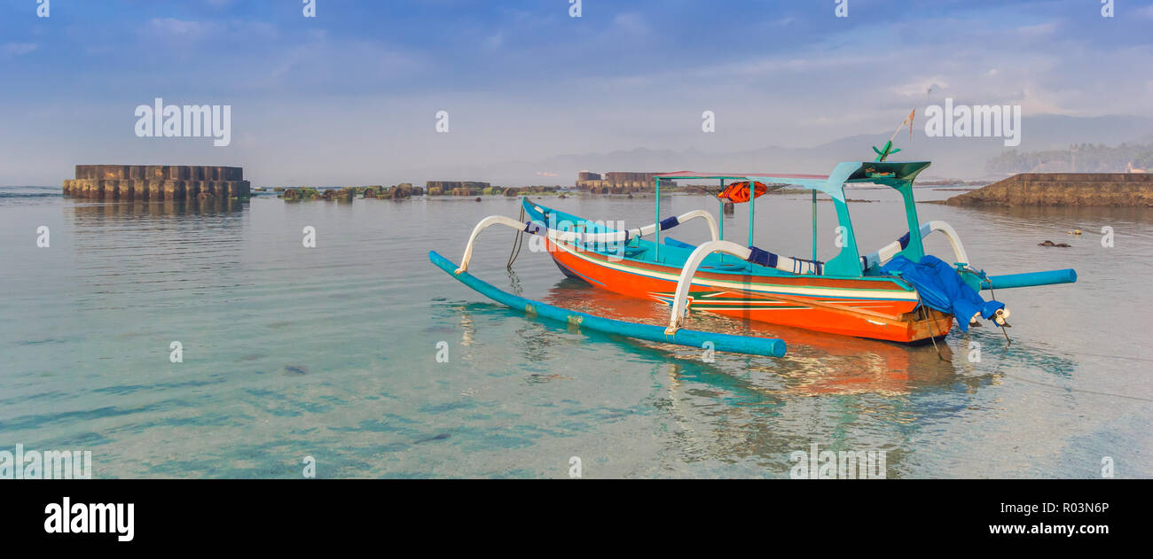 Panorama of a traditional indonesian fishing boat at the Candidasa ...