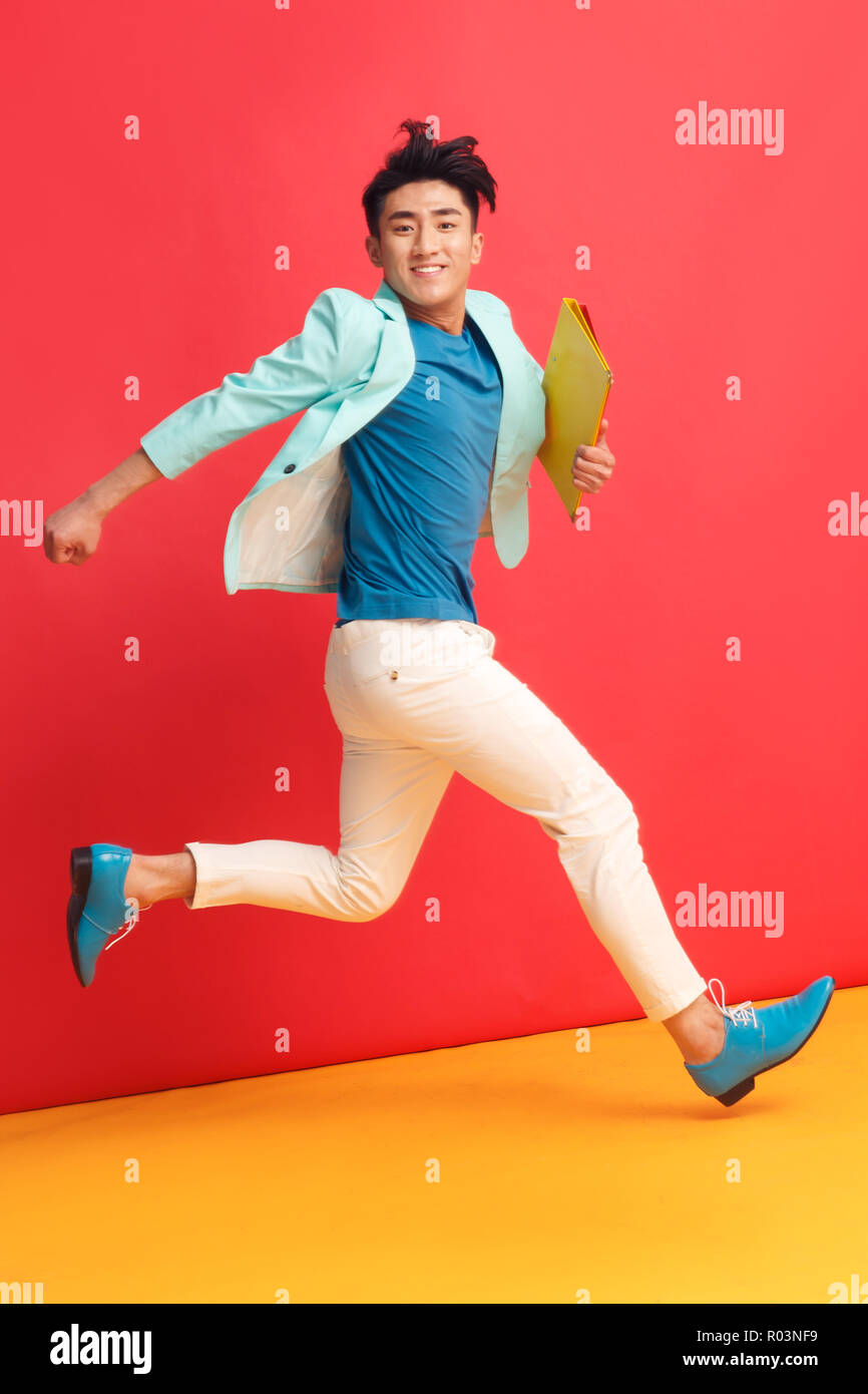 Indian businessman running file hi-res stock photography and images - Alamy