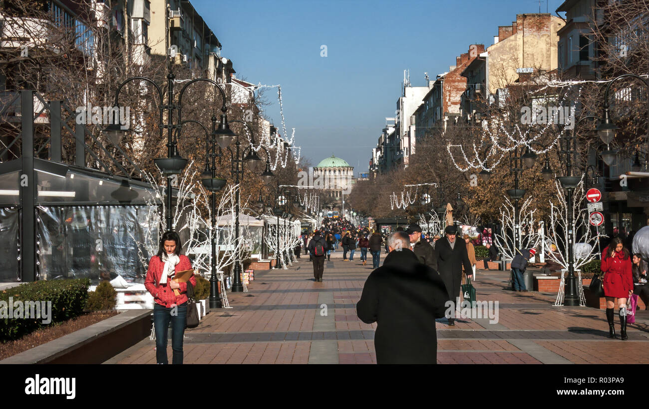 SOFIA, BULGARIA - DECEMBER 20, 2016: Walking people on Vitosha Boulevard in city of Sofia ...