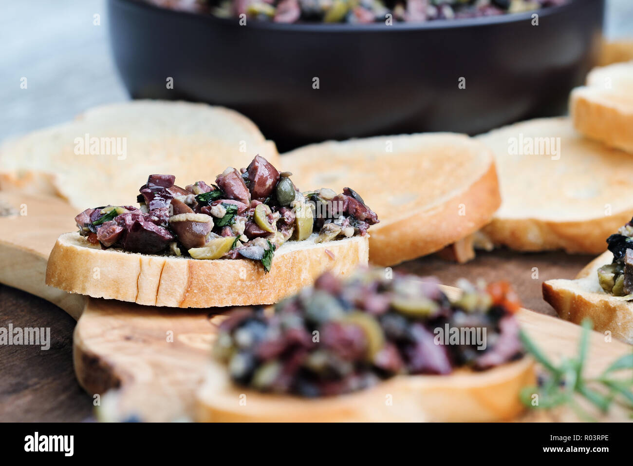 Homemade mixed Olive Tapenade made with garlic, capers, olive oil ...