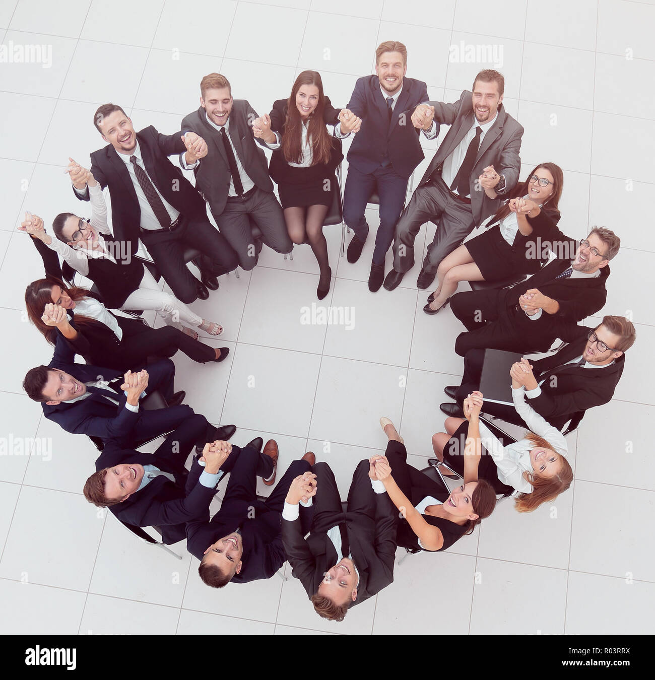 concept of team building .large successful business team sitting in a ...