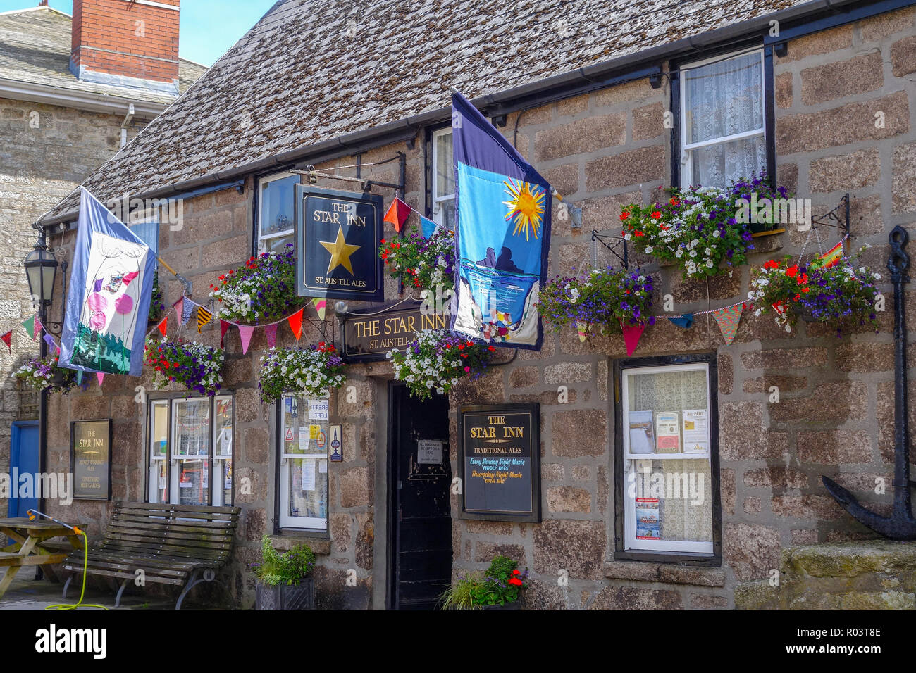 Flags for the Lafrowda festival outside the Star public house or pub ...