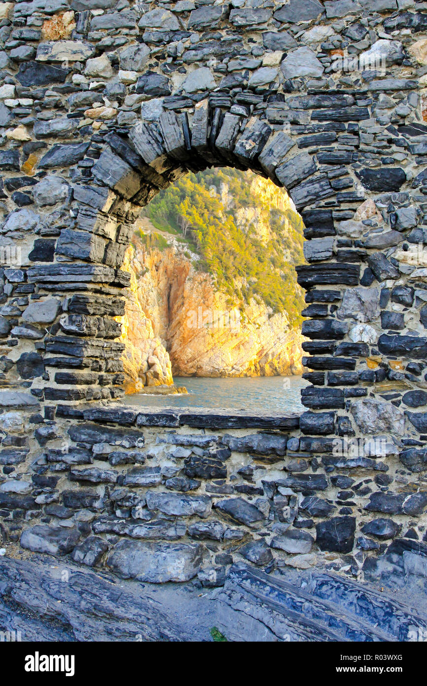 Window in stone wall at Liguria coast Stock Photo - Alamy