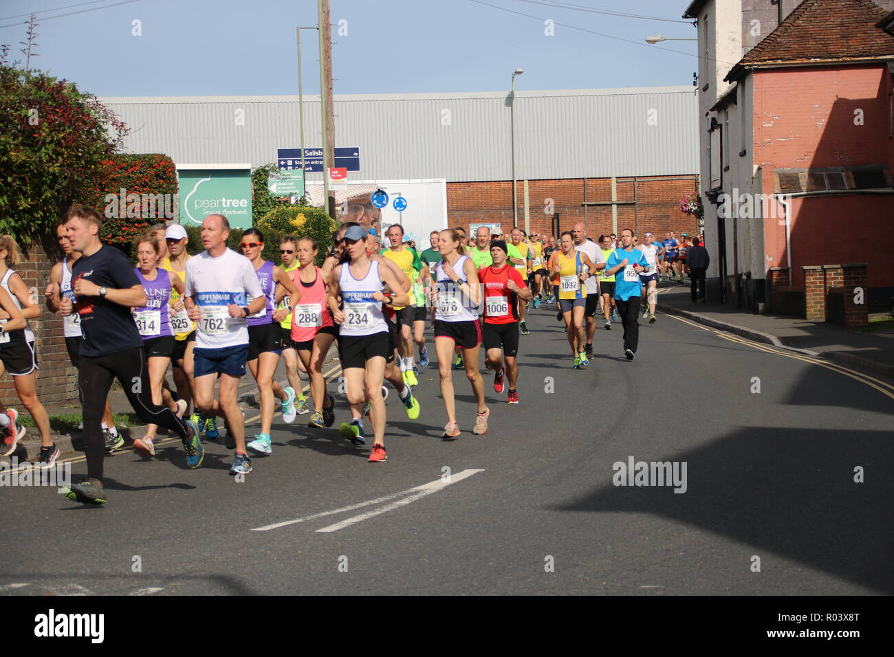 A large group of runners running through Salisbury City centre during ...