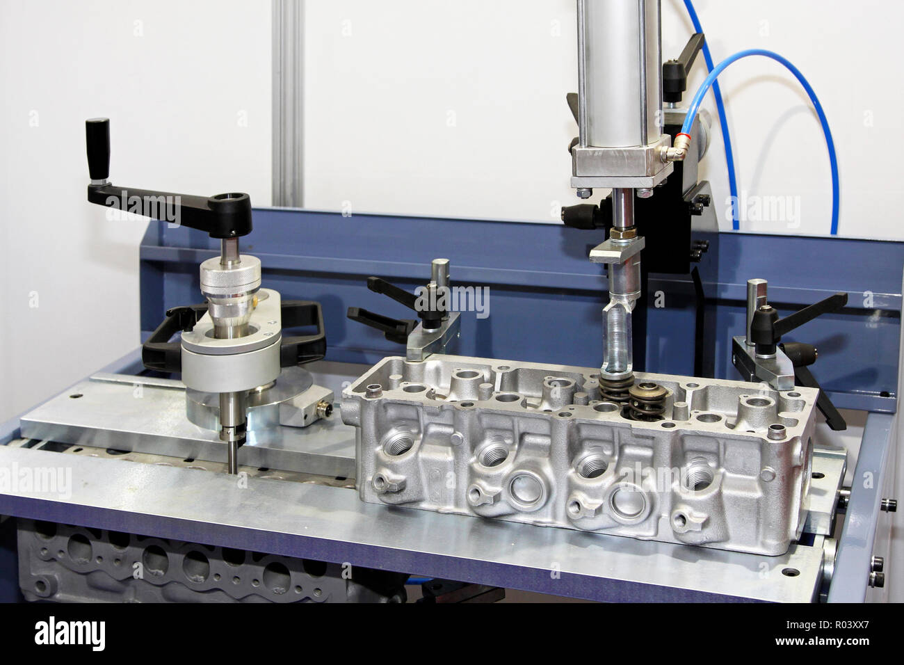 Aluminum engine head at auto repair garage Stock Photo - Alamy