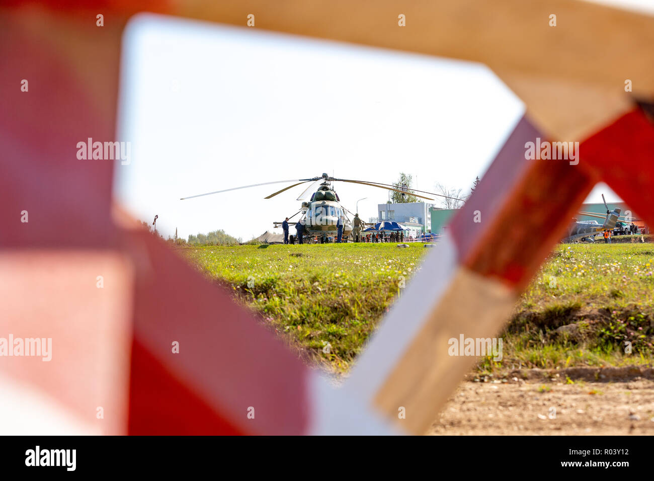Military helicopter lands on the ground during Military Exercise Stock ...