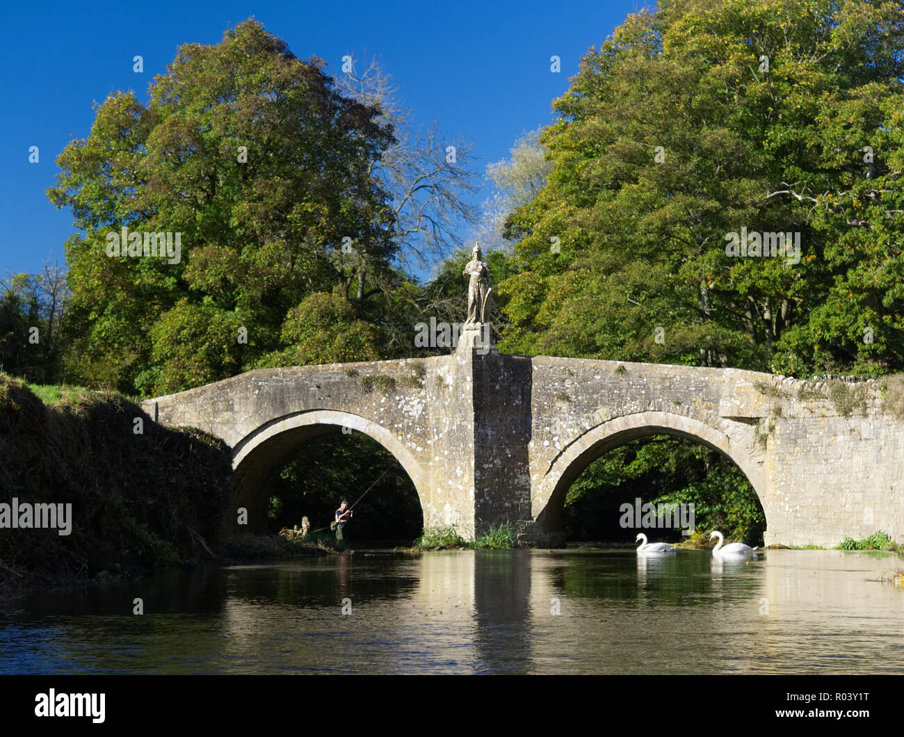 Iford bridge with statue of Britannia facing east over the River Frome ...