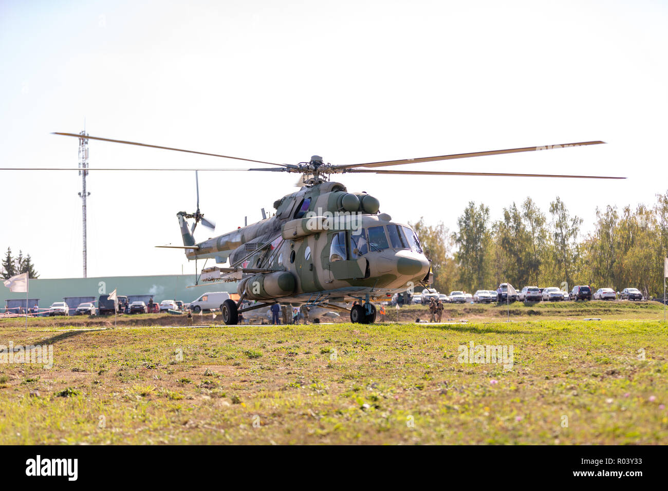 Military helicopter lands on the ground during Military Exercise Stock ...