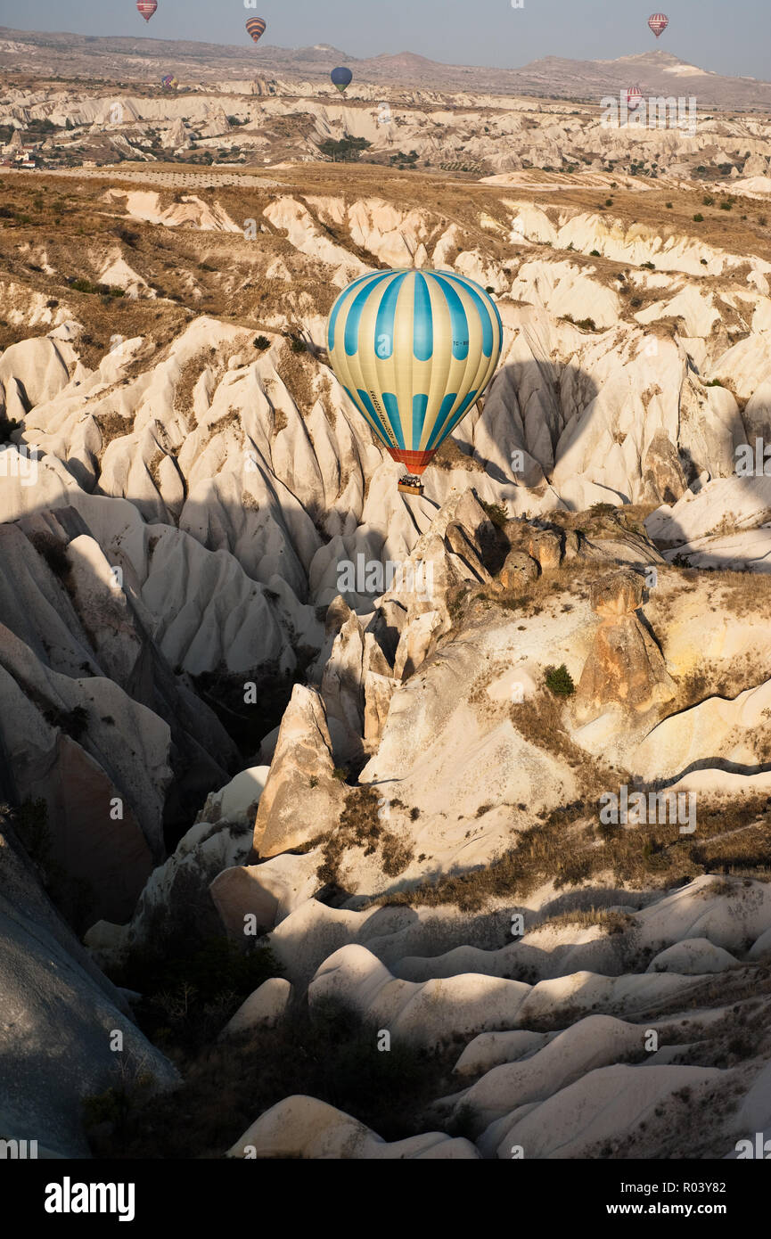 "Hot air balloons above rock formations in Cappadocia, Turkey Stock ...