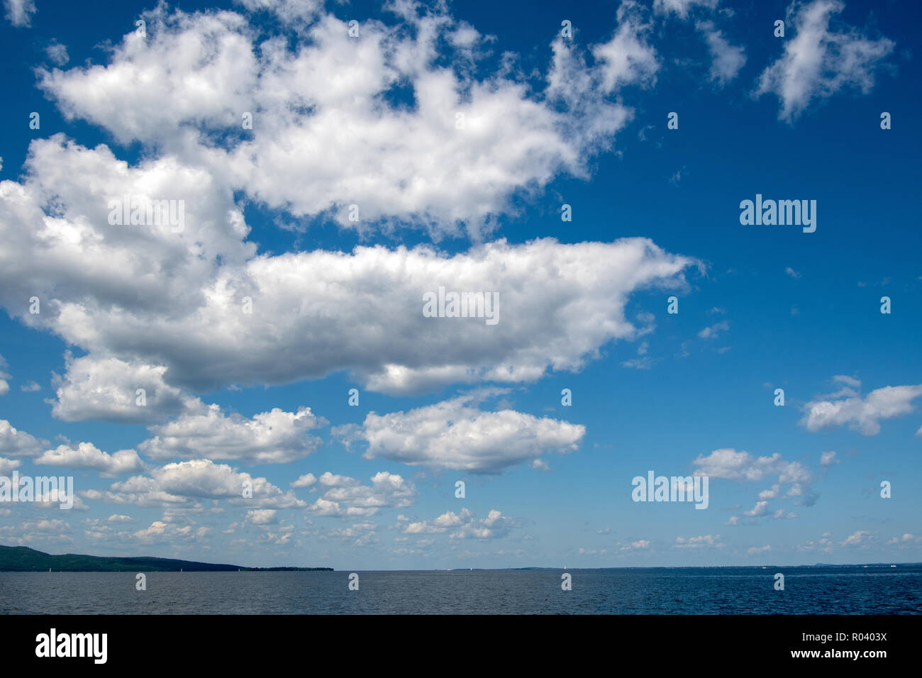 Lake Champlain with blue sky and clouds Stock Photo - Alamy