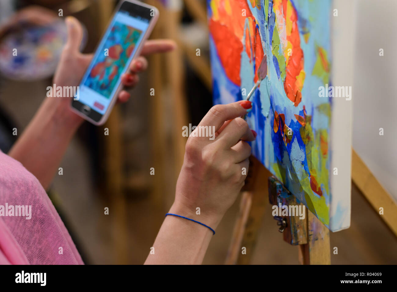 Making a reproduction of painting Stock Photo - Alamy