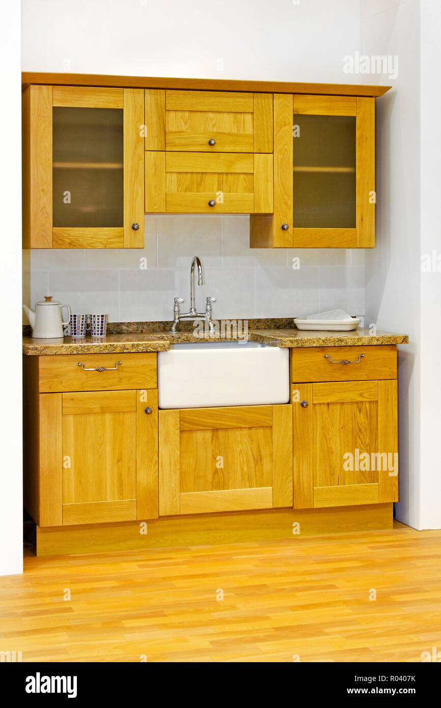 Traditional wooden kitchen counter with old style sink Stock Photo - Alamy