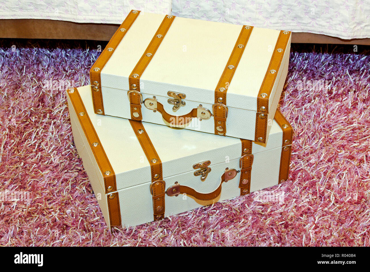 Two retro beige suitcases with brown straps Stock Photo - Alamy