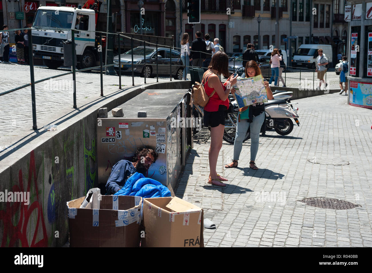 Porto, Portugal, tourists and poverty Stock Photo - Alamy