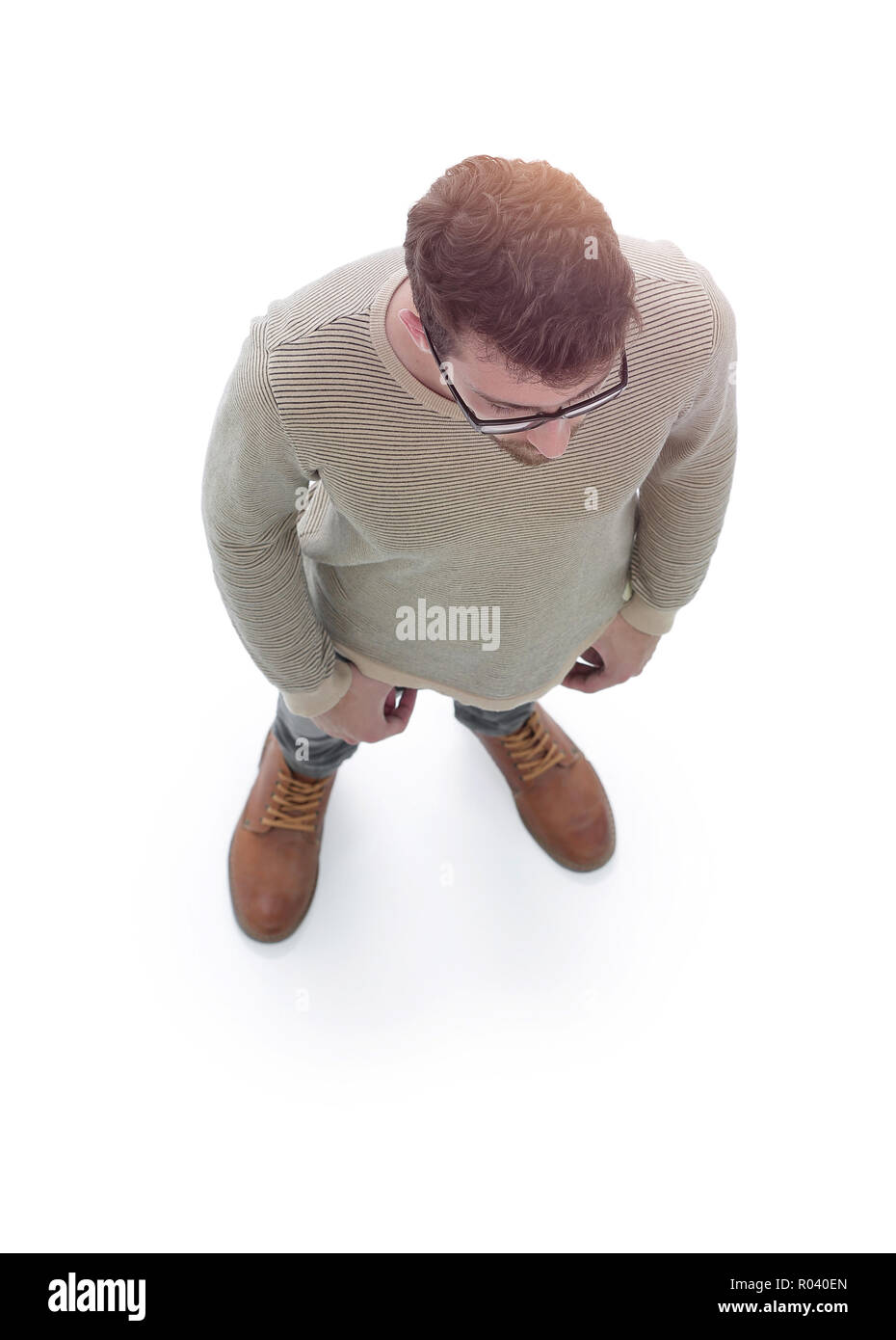 view from above. serious young man looking forward. Portrait in full ...