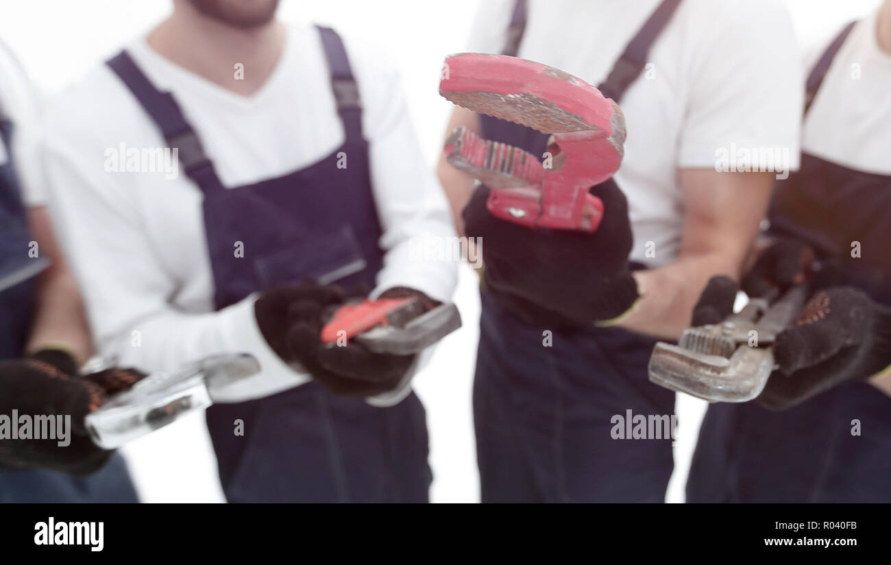 closeup.gas keys in the hands of the builders .isolated on white Stock ...