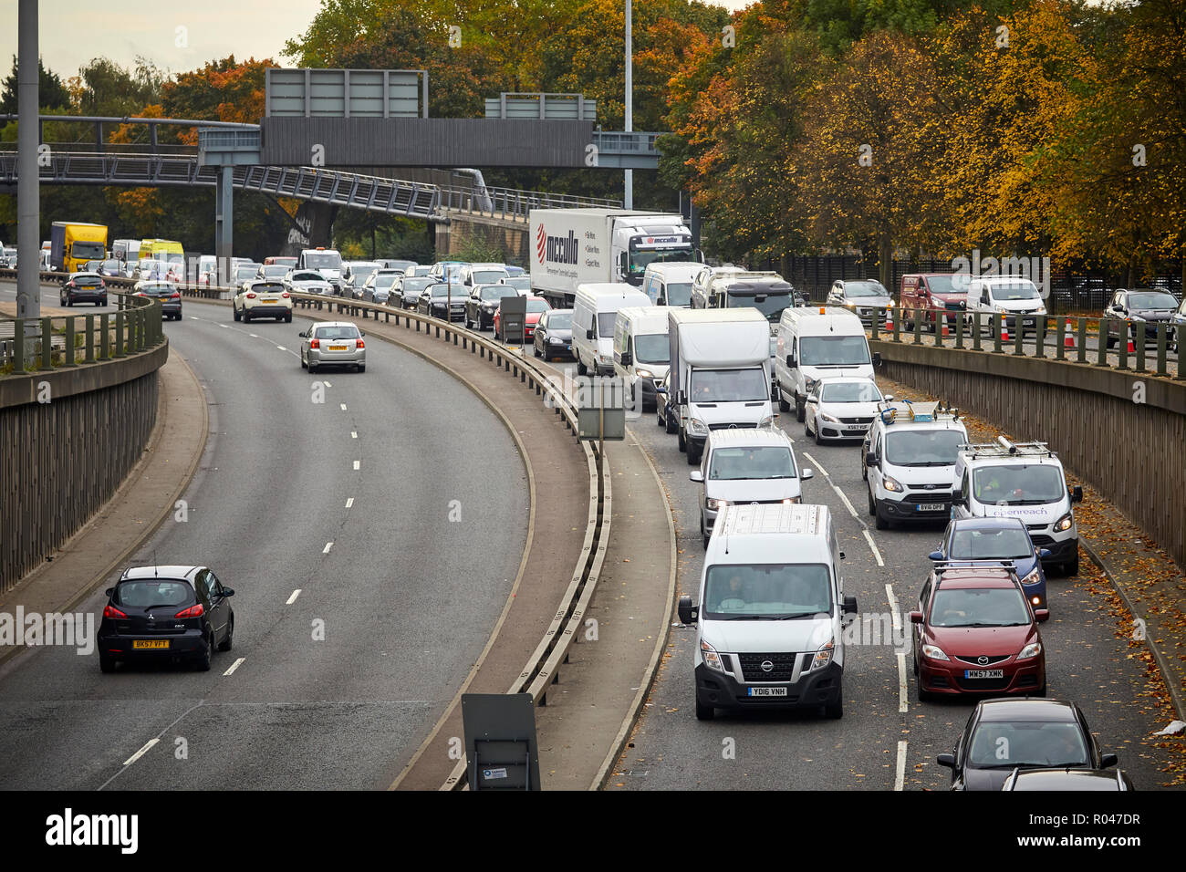 Roadworks creating busy traffic queue jams in one direction on A57 M ...