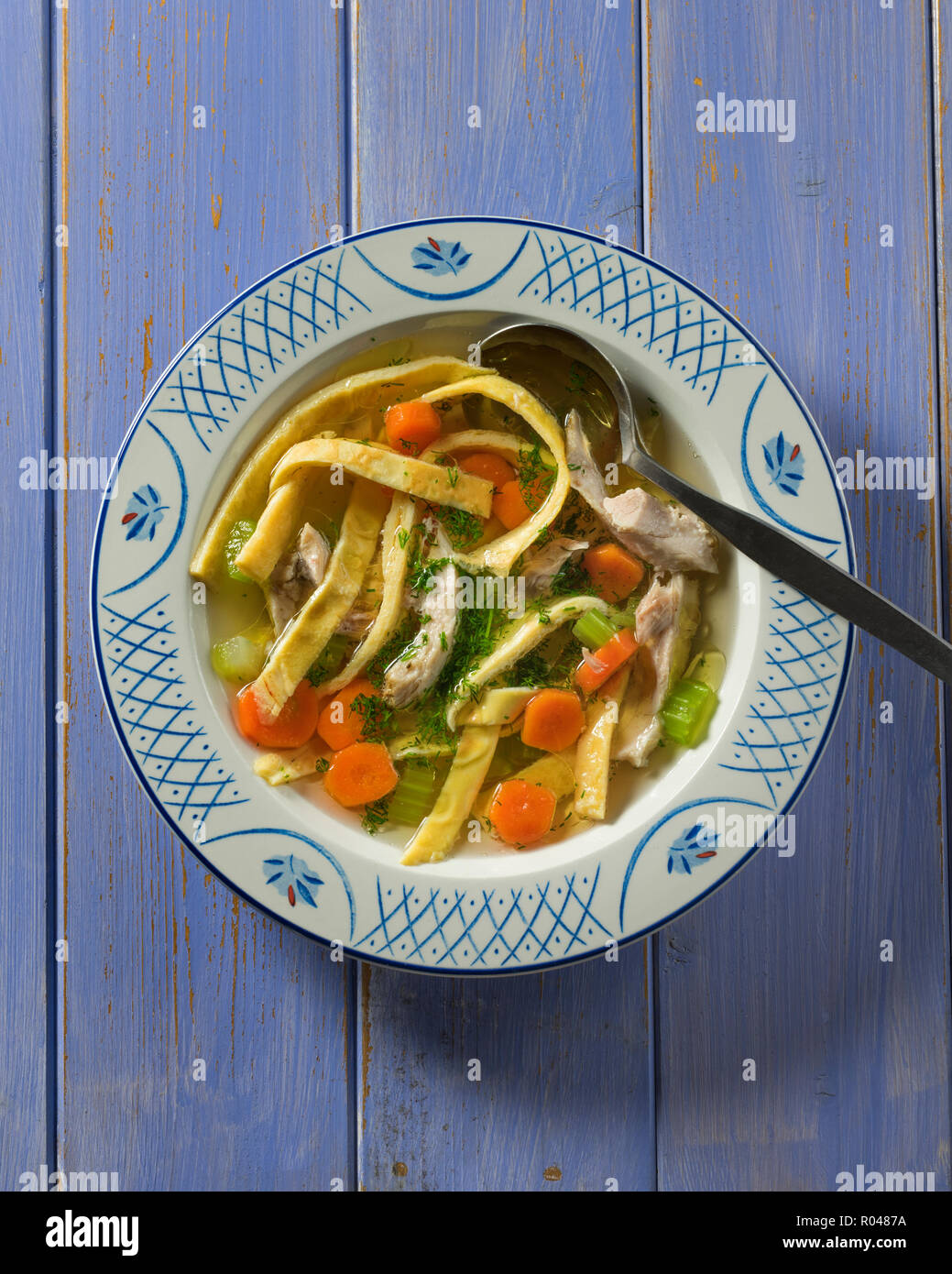 Lokshen soup. Chicken soup with egg noodles. Traditional Jewish food ...