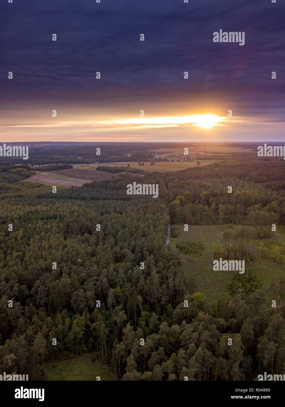 Beautiful sunset with strange clouds over forest. Drone landscape Stock ...
