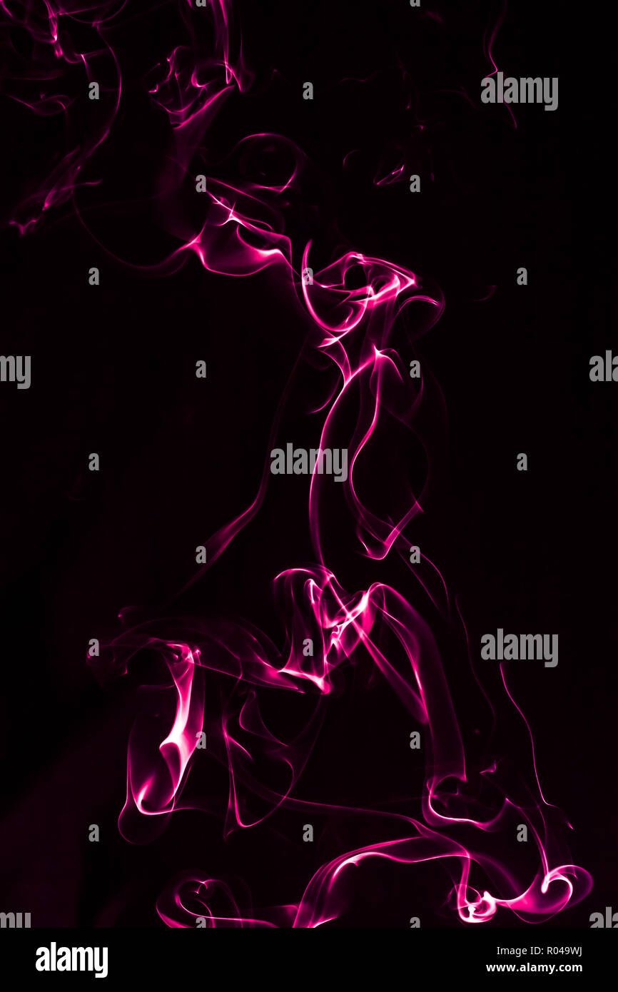 Creative abstract pink smoke pattern on black background Stock Photo ...