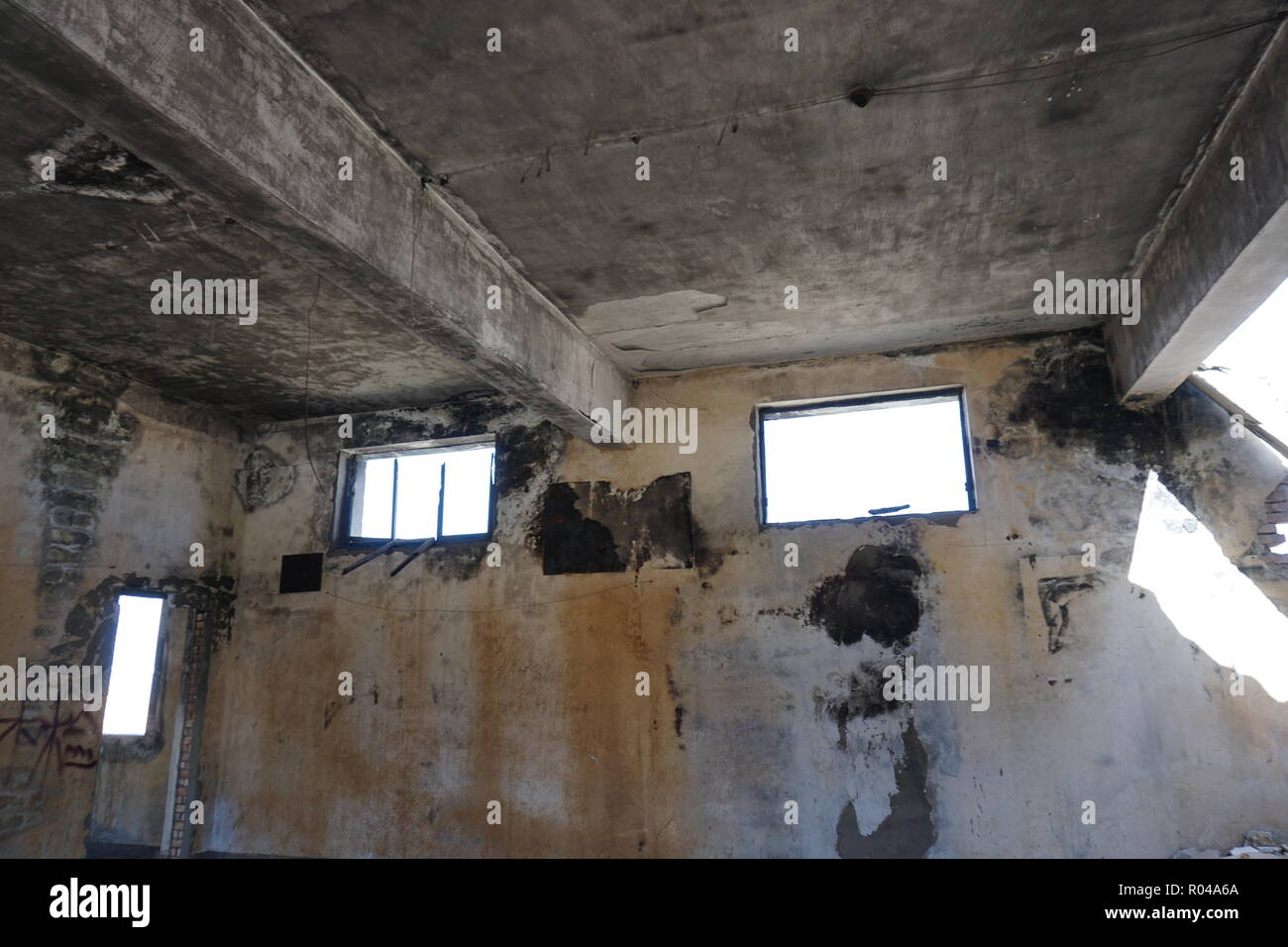 Abandoned house with boarded up windows and doors Stock Photo - Alamy