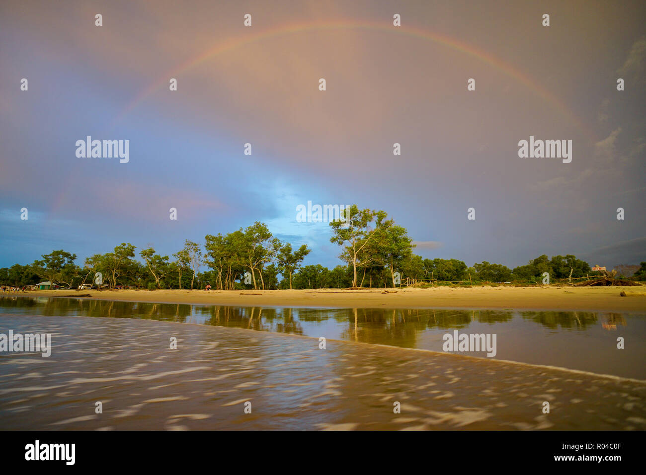 Rainbow over beautiful beach in Borneo Stock Photo - Alamy