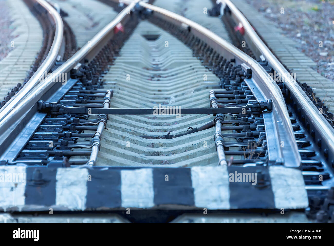 arrow rail rails sunny day Stock Photo - Alamy