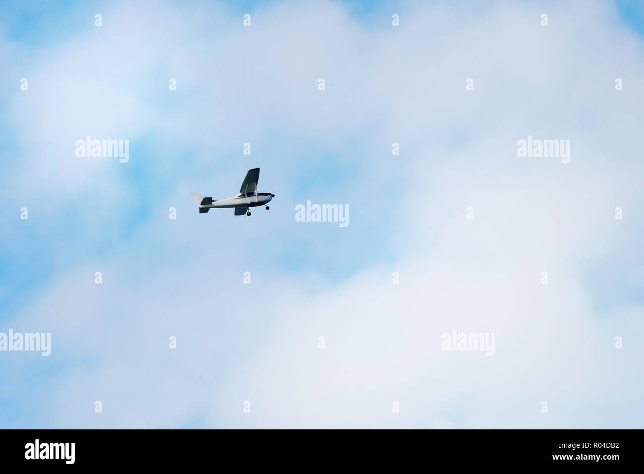 Small propeller plane flying in the sky hi-res stock photography and ...