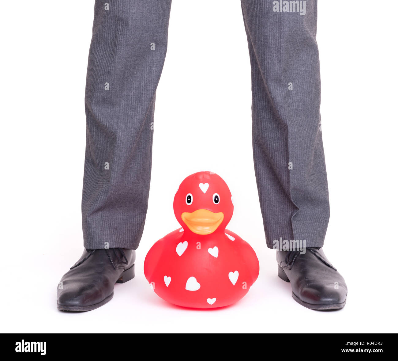 Businessman with black shoes, red ducky in the middle, isolated on ...