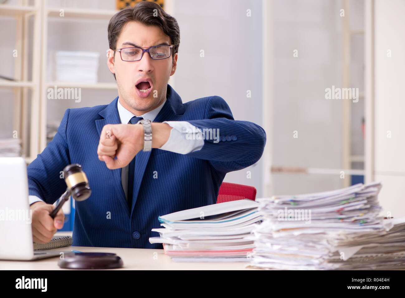 Young handsome judge working in court Stock Photo - Alamy