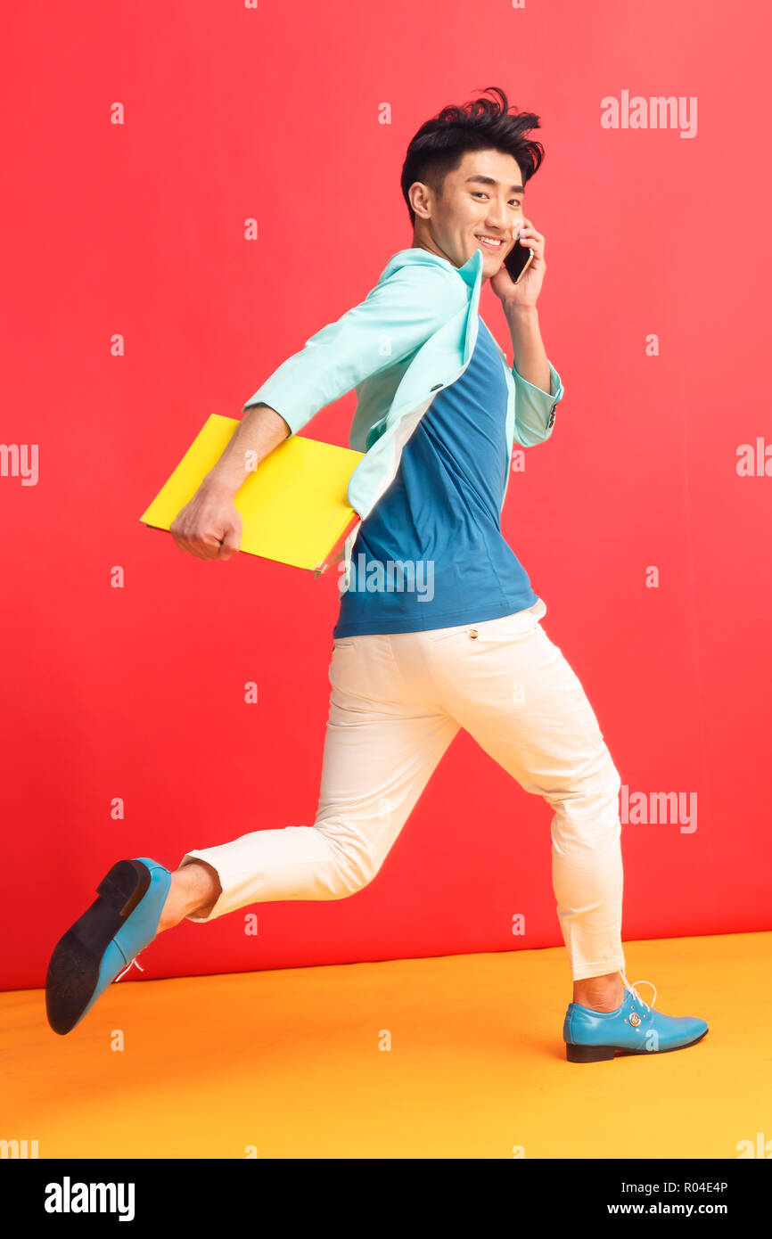 Indian businessman running file hi-res stock photography and images - Alamy