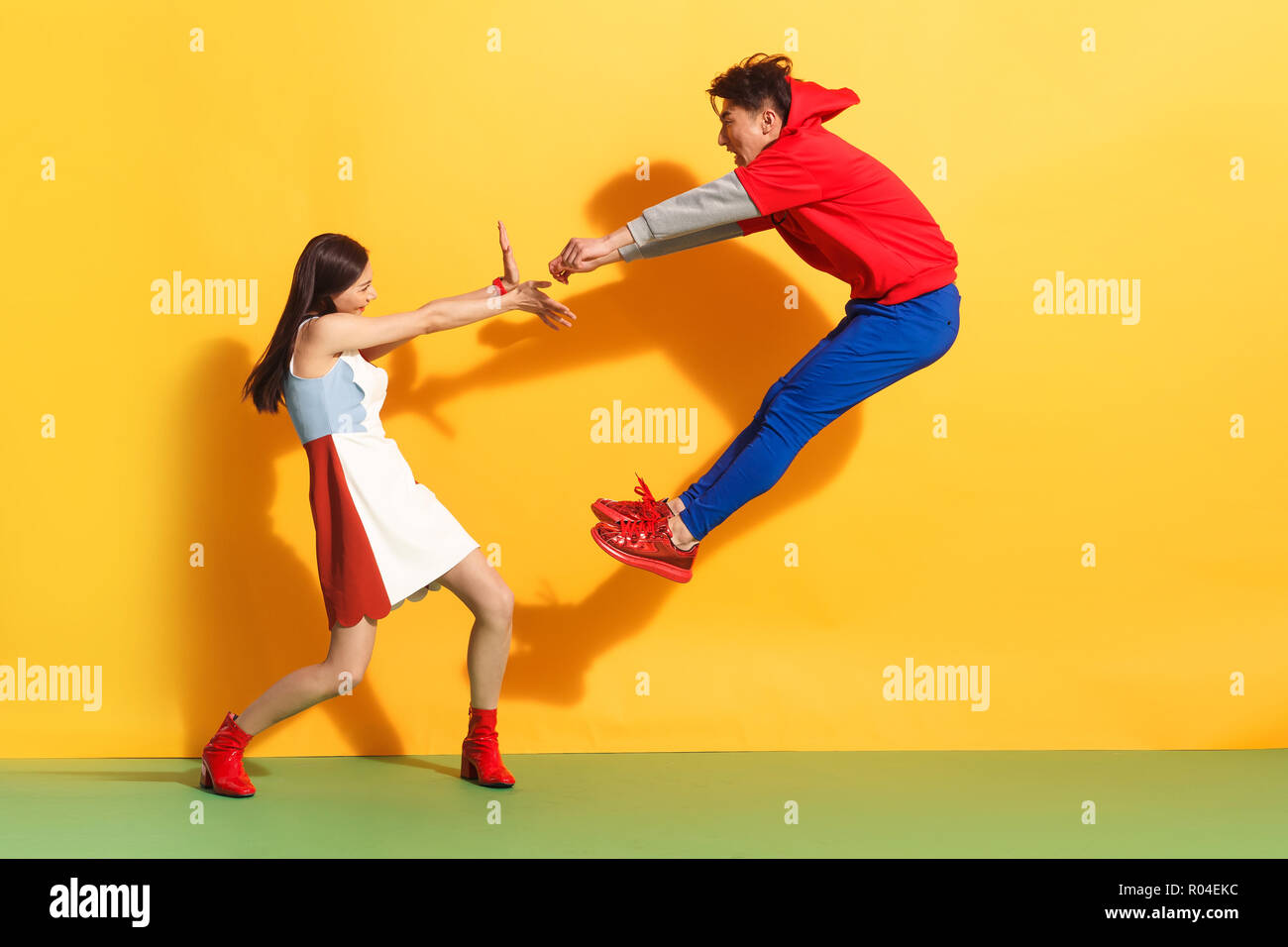 Fighting, young couples Stock Photo - Alamy