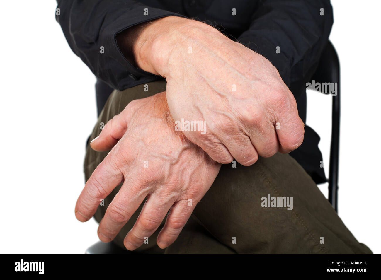 Photo of a senior man's hand resting on a chair Stock Photo - Alamy