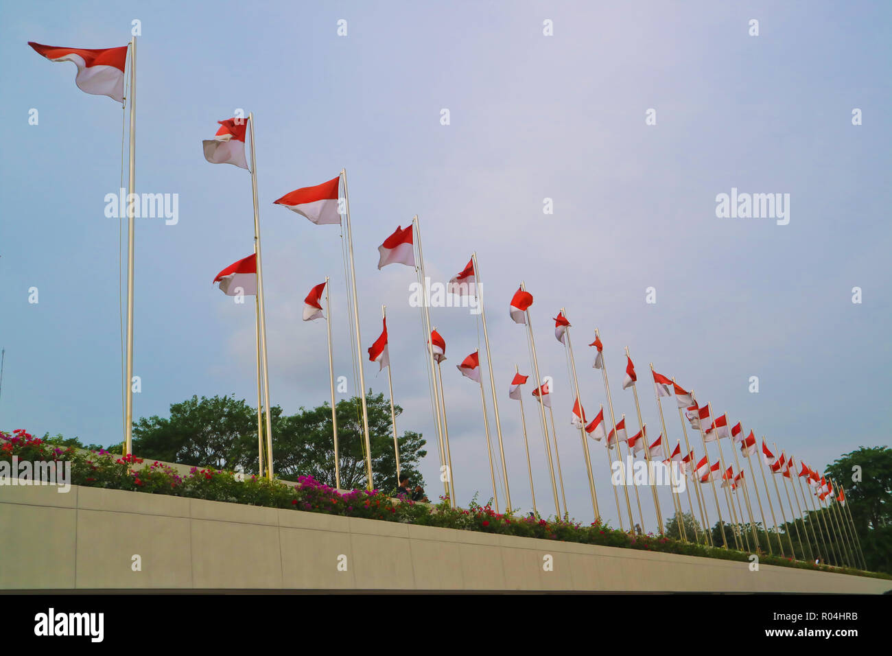 line of flags at West Irian Liberation Monument Stock Photo - Alamy