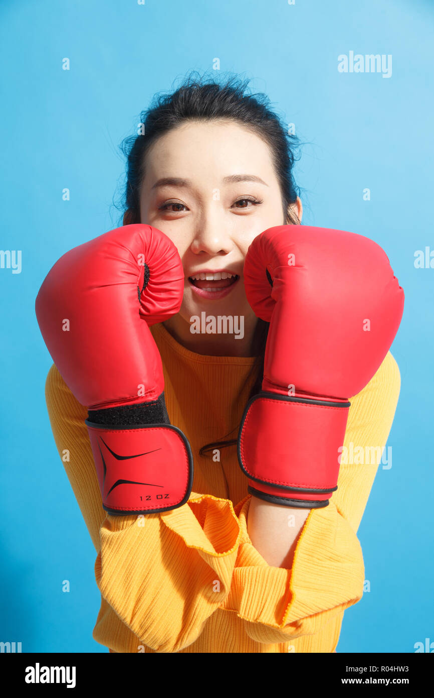 Asian woman boxer smiling hi-res stock photography and images - Alamy