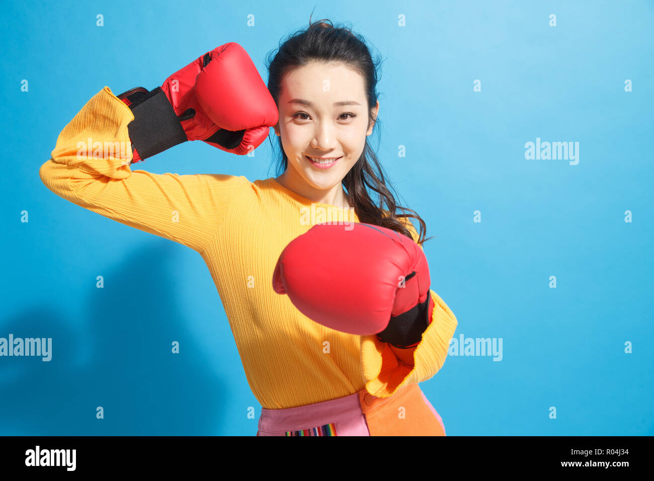 Asian woman boxer smiling hi-res stock photography and images - Alamy