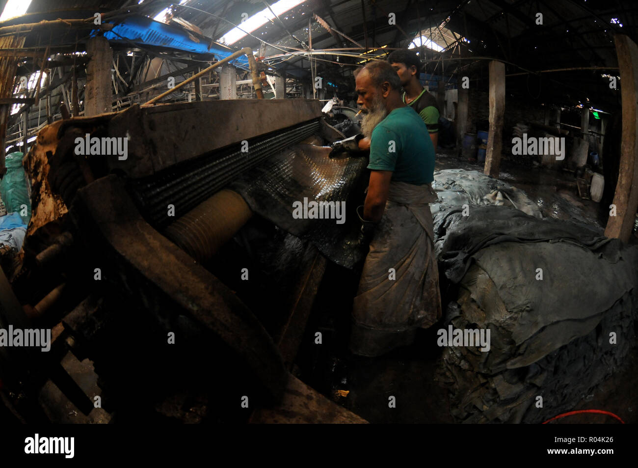 Dhaka, Bangladesh - January 04, 2016: Bangladeshi tannery workers ...