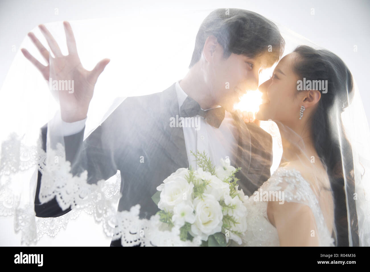Romance of the bride and groom Stock Photo - Alamy