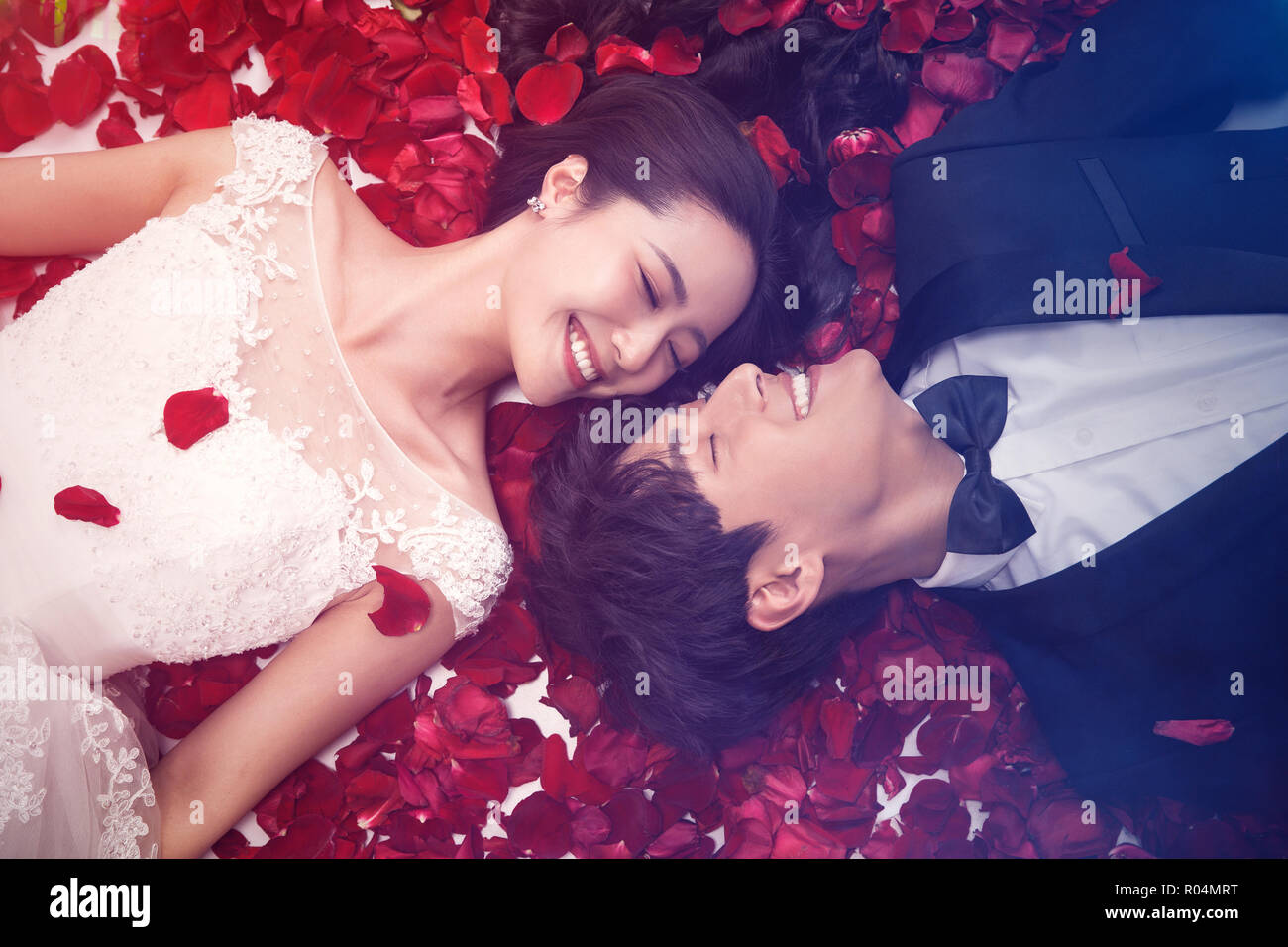Romance of the bride and groom Stock Photo - Alamy