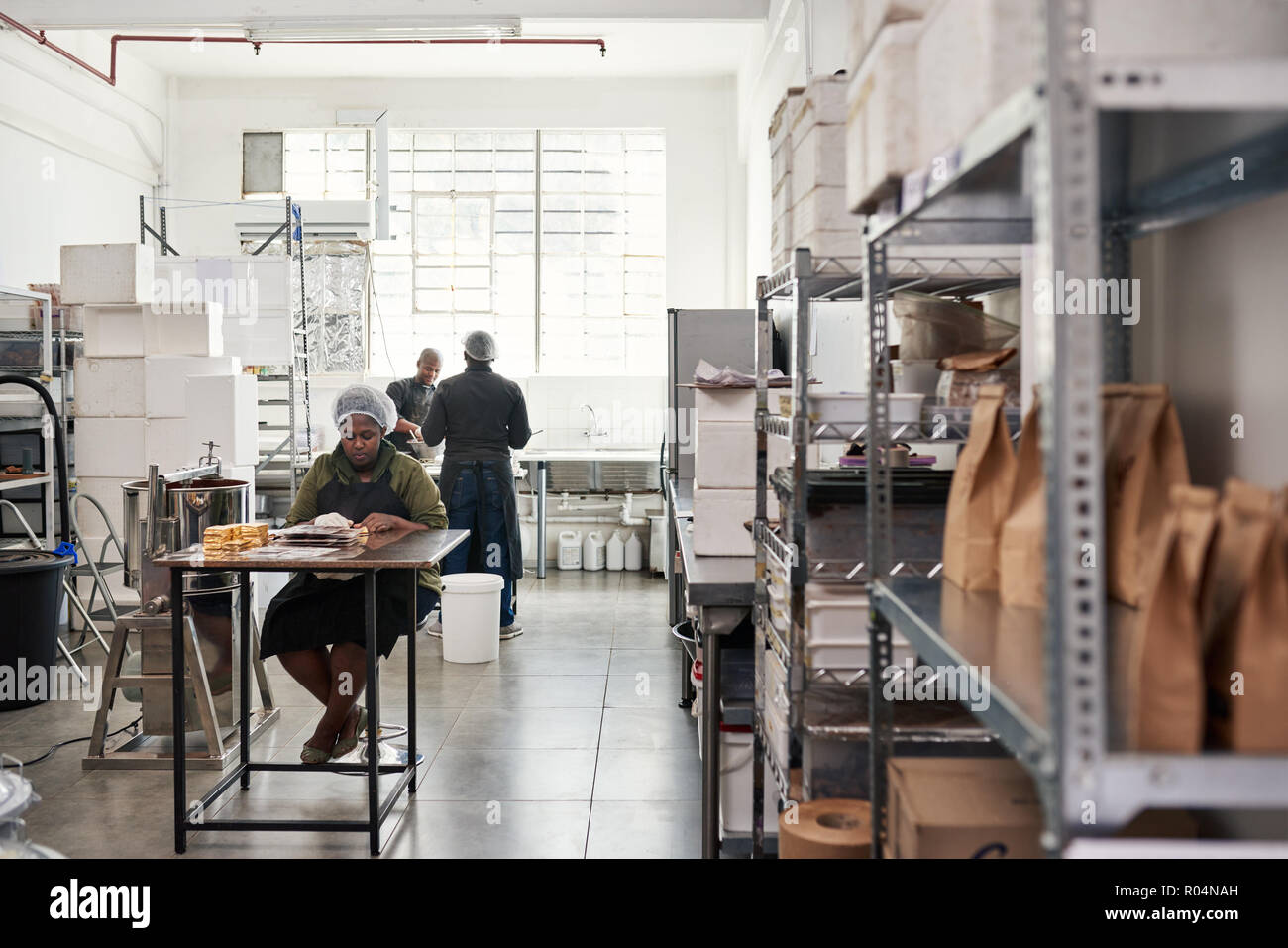 Inspecting chocolate production line hi-res stock photography and ...