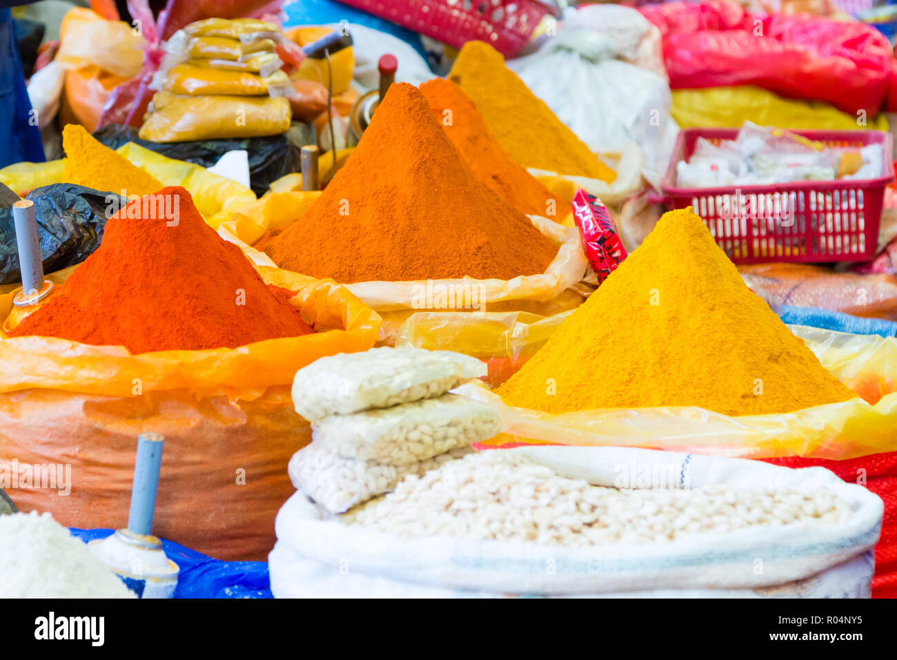 Colorful spices pyramids background. Sucre traditional market, Bolivia ...