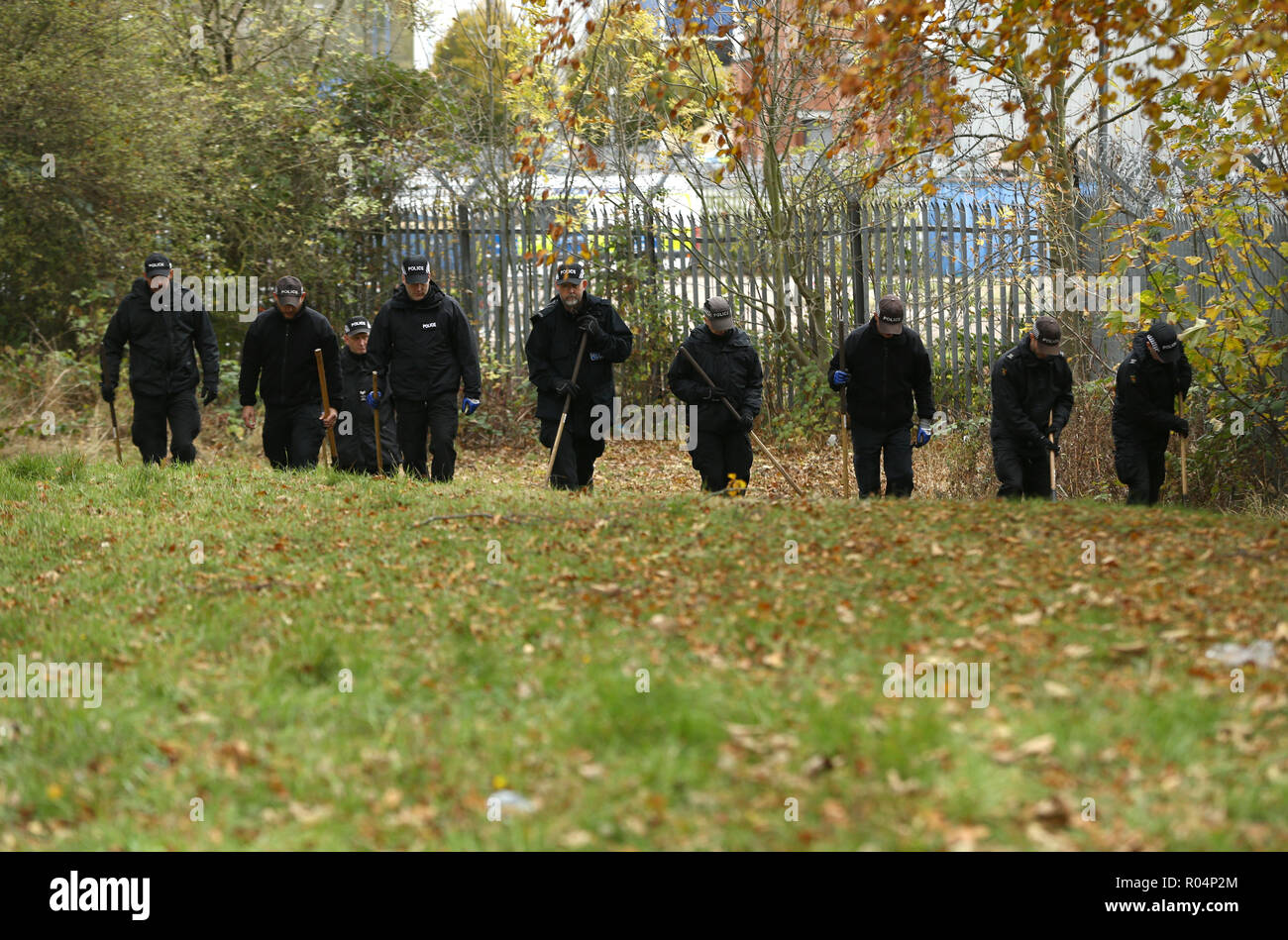 Police search teams search an area of land near The King Power Stadium ...
